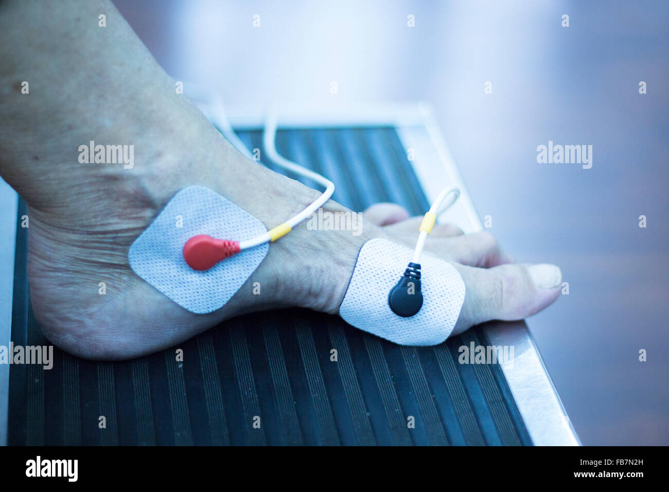 Physiotherapy and orthopedics clinic patient in electrical impulse ...