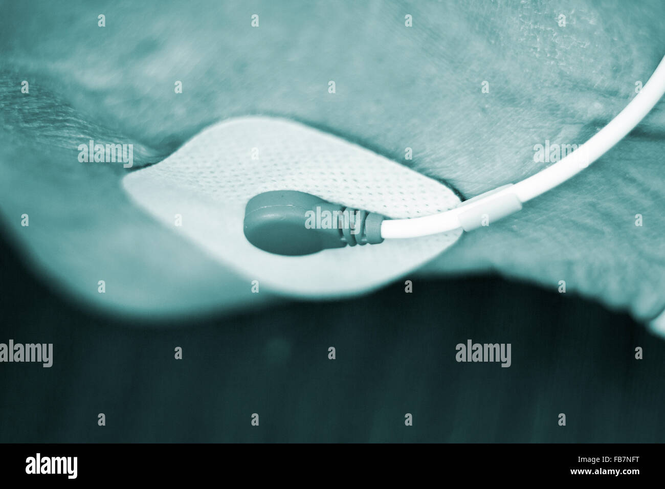 Physiotherapy and orthopedics clinic patient in electrical impulse ...