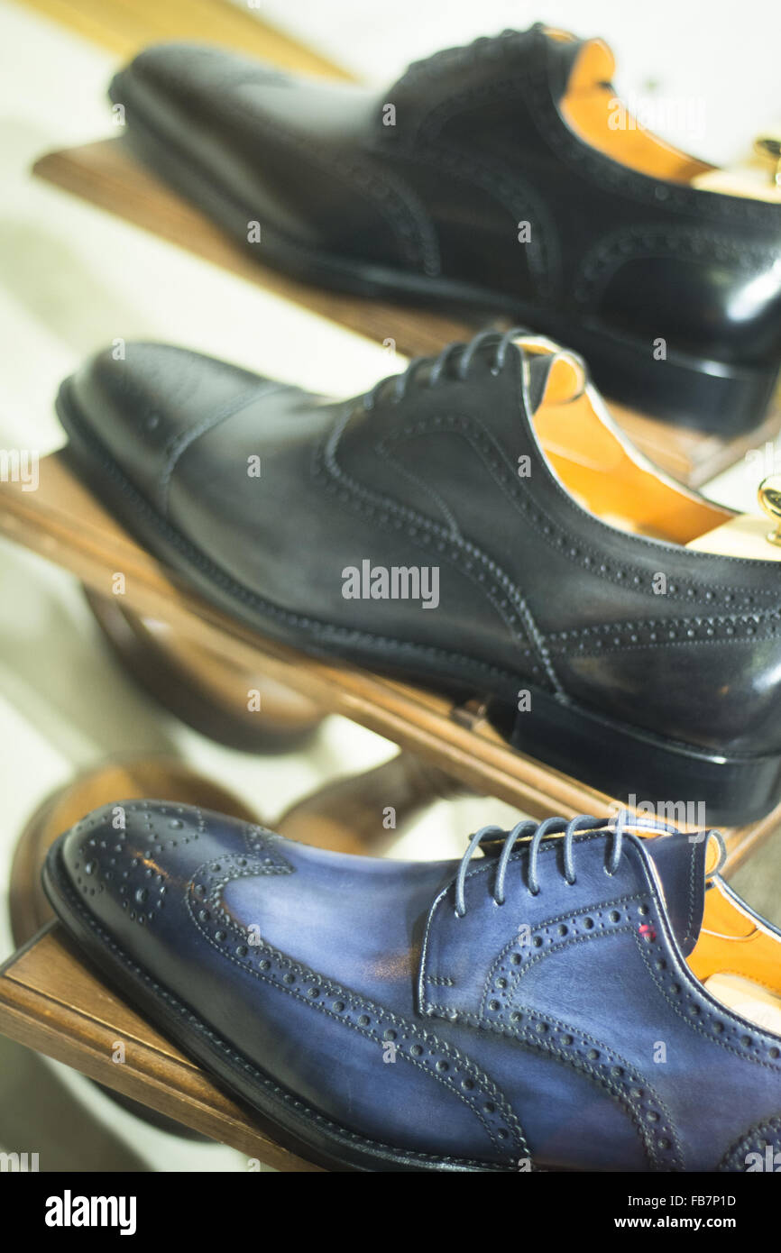 Shoe retail store men's shoes on display in shop window photo Stock ...