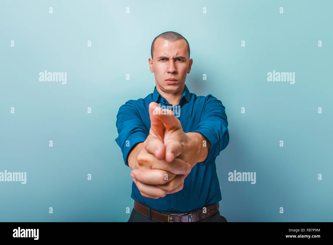 Man pointing gun hi-res stock photography and images - Alamy