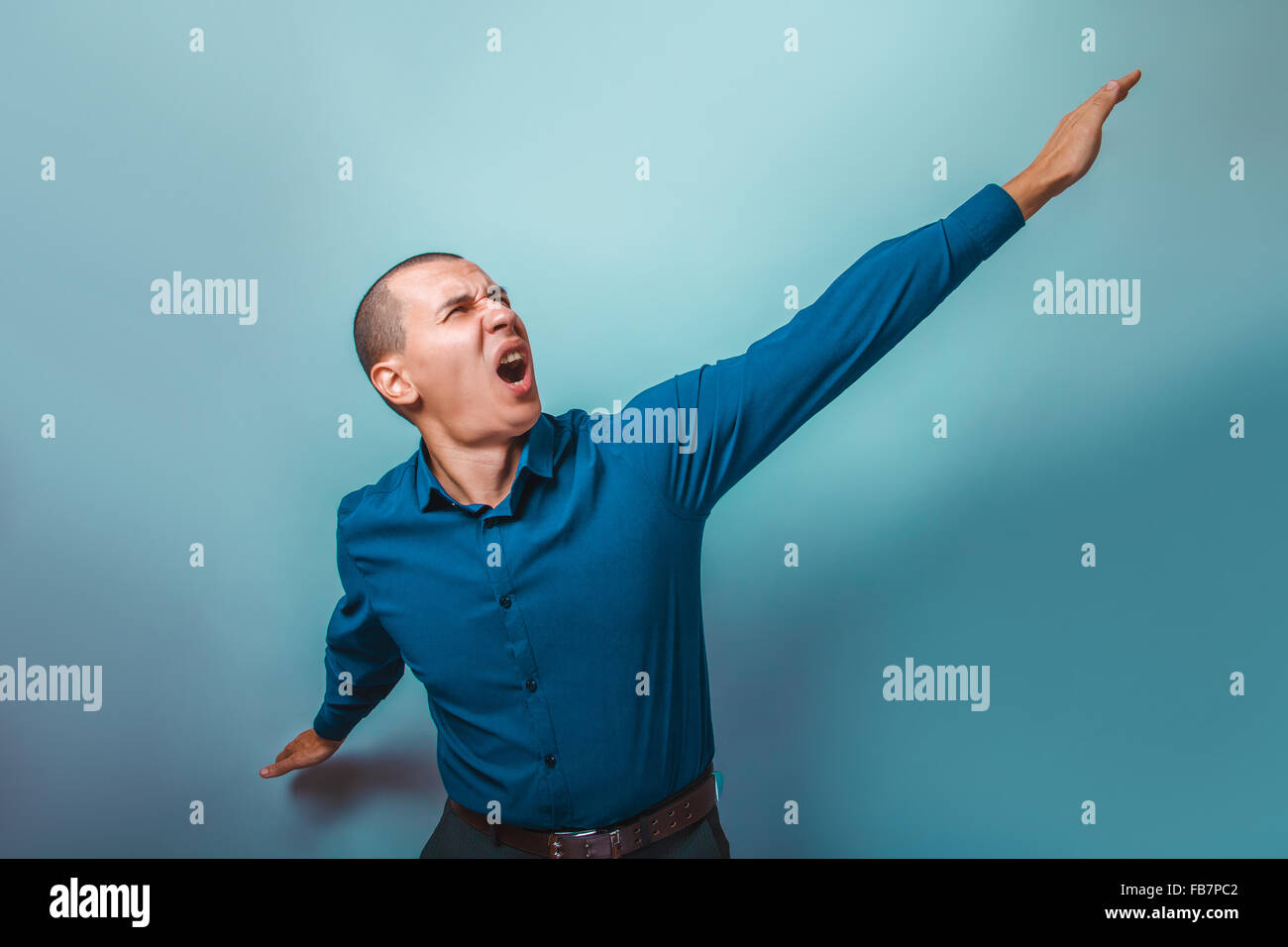 a man of European appearance thirty years of hands apart gesture Stock ...