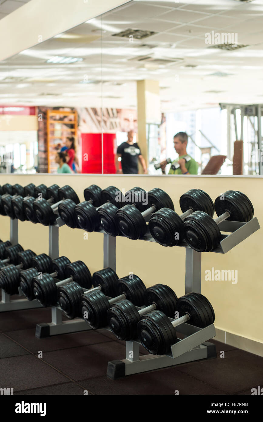 Dumbbells in gym Stock Photo - Alamy