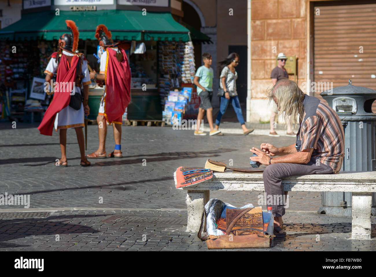 Rome, Italy - August 22, 2015: the famous Navona square an artist man ...