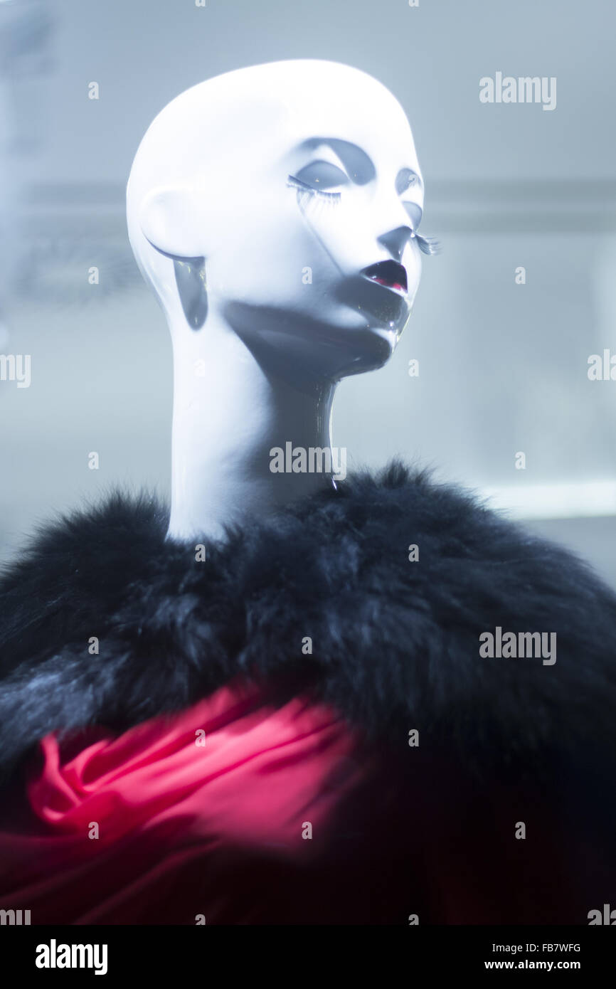 Store clothes bald dummy in women's clothing shop photo Stock Photo - Alamy