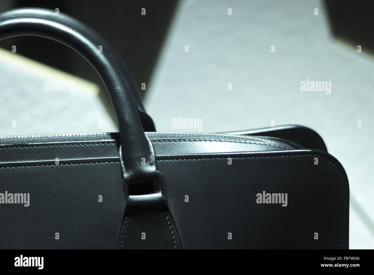 Leather briefcase bag in store window on display photograph Stock Photo ...