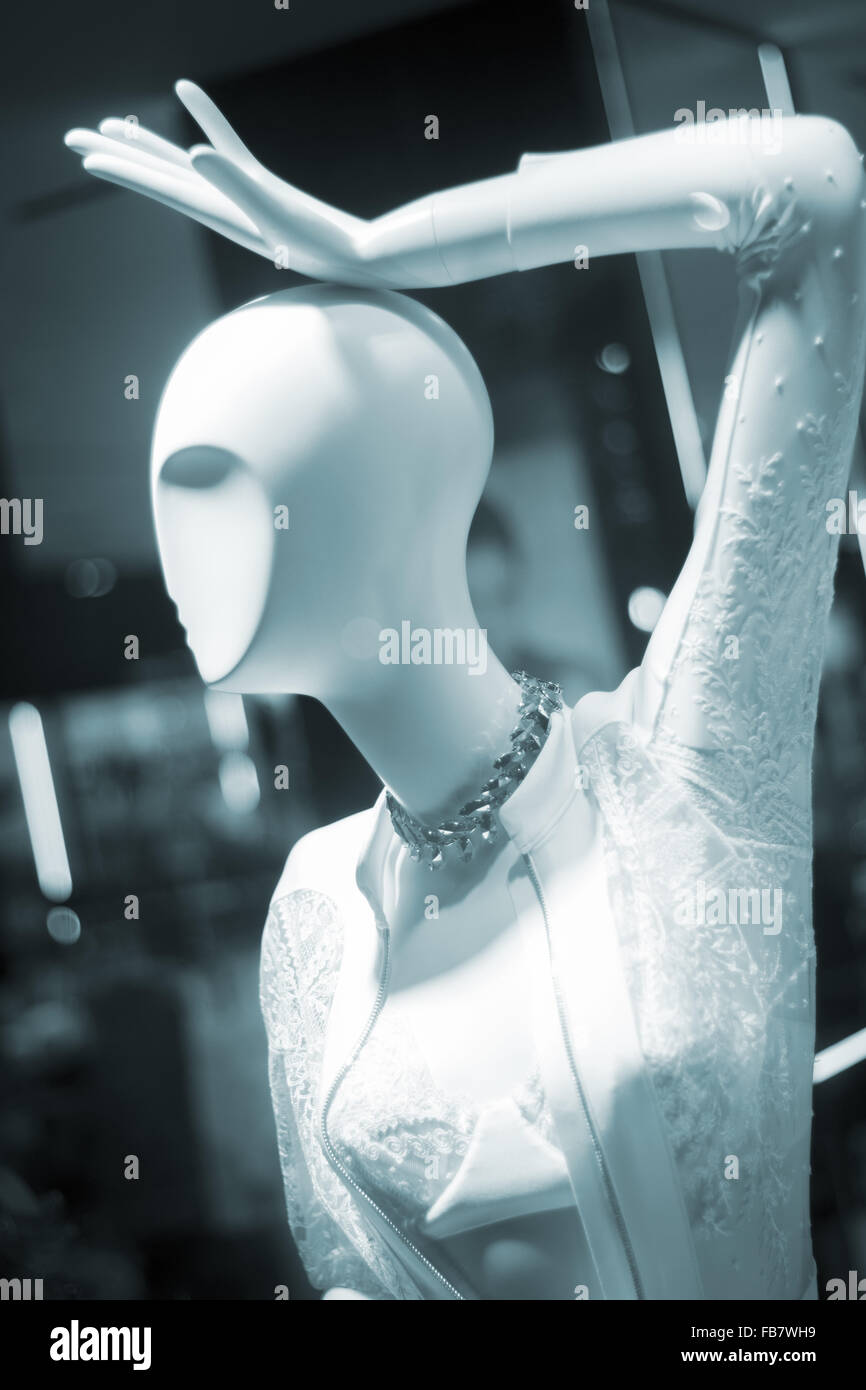 Store clothes dummy in women's clothing shop photo Stock Photo - Alamy