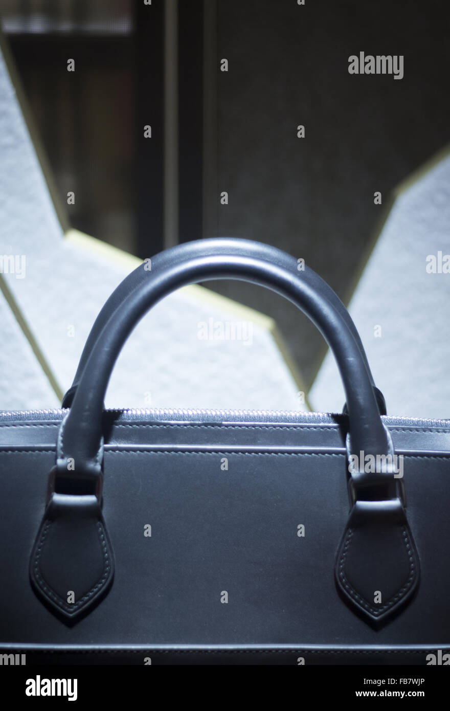 Leather briefcase bag in store window on display photograph Stock Photo ...