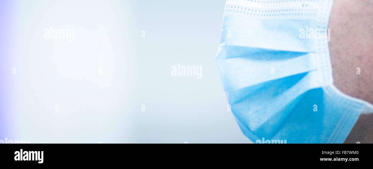 Surgeon in hospital surgery operating room wearing surgical mask photo ...