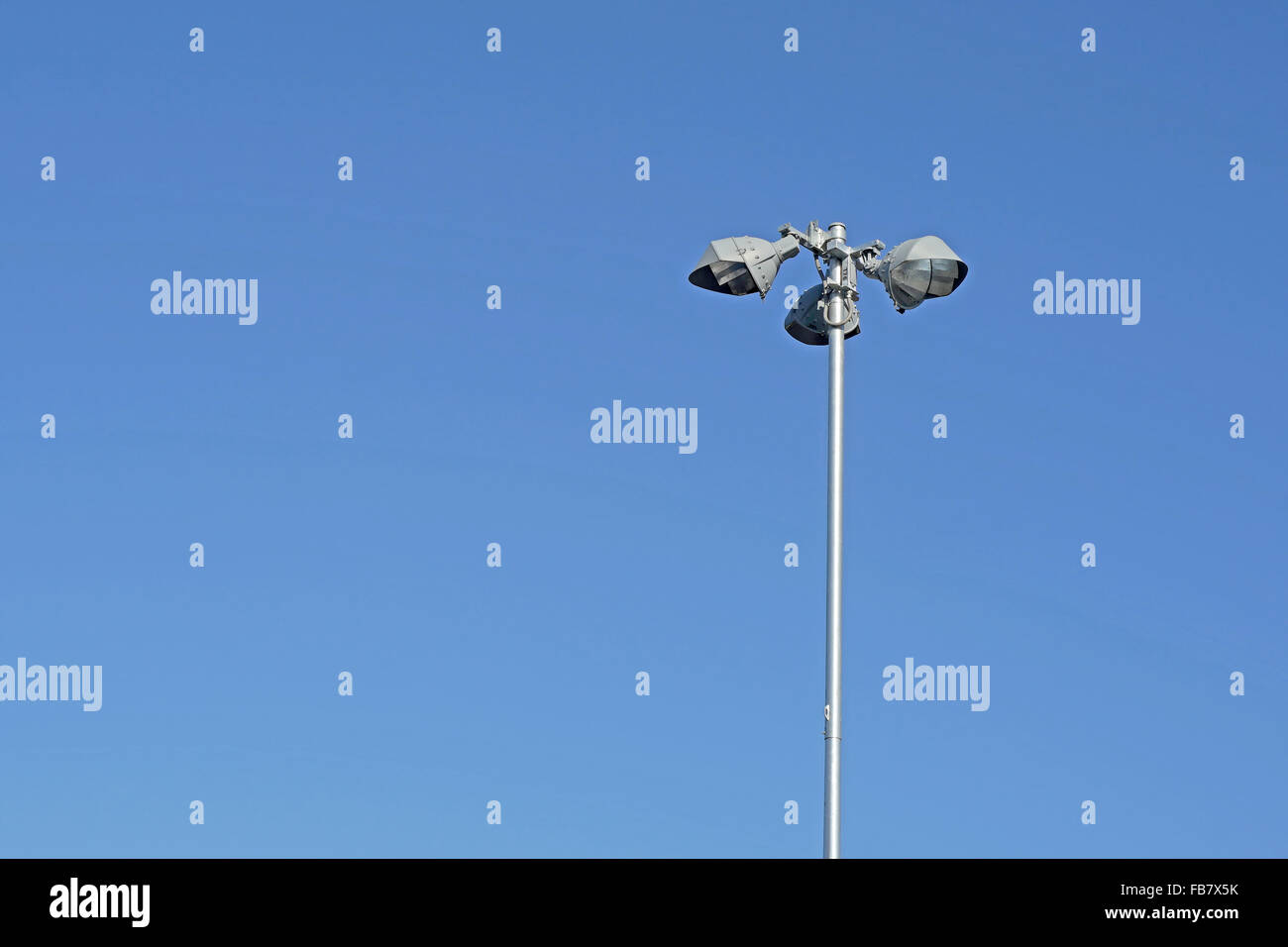 light post on beautiful sky background Stock Photo - Alamy