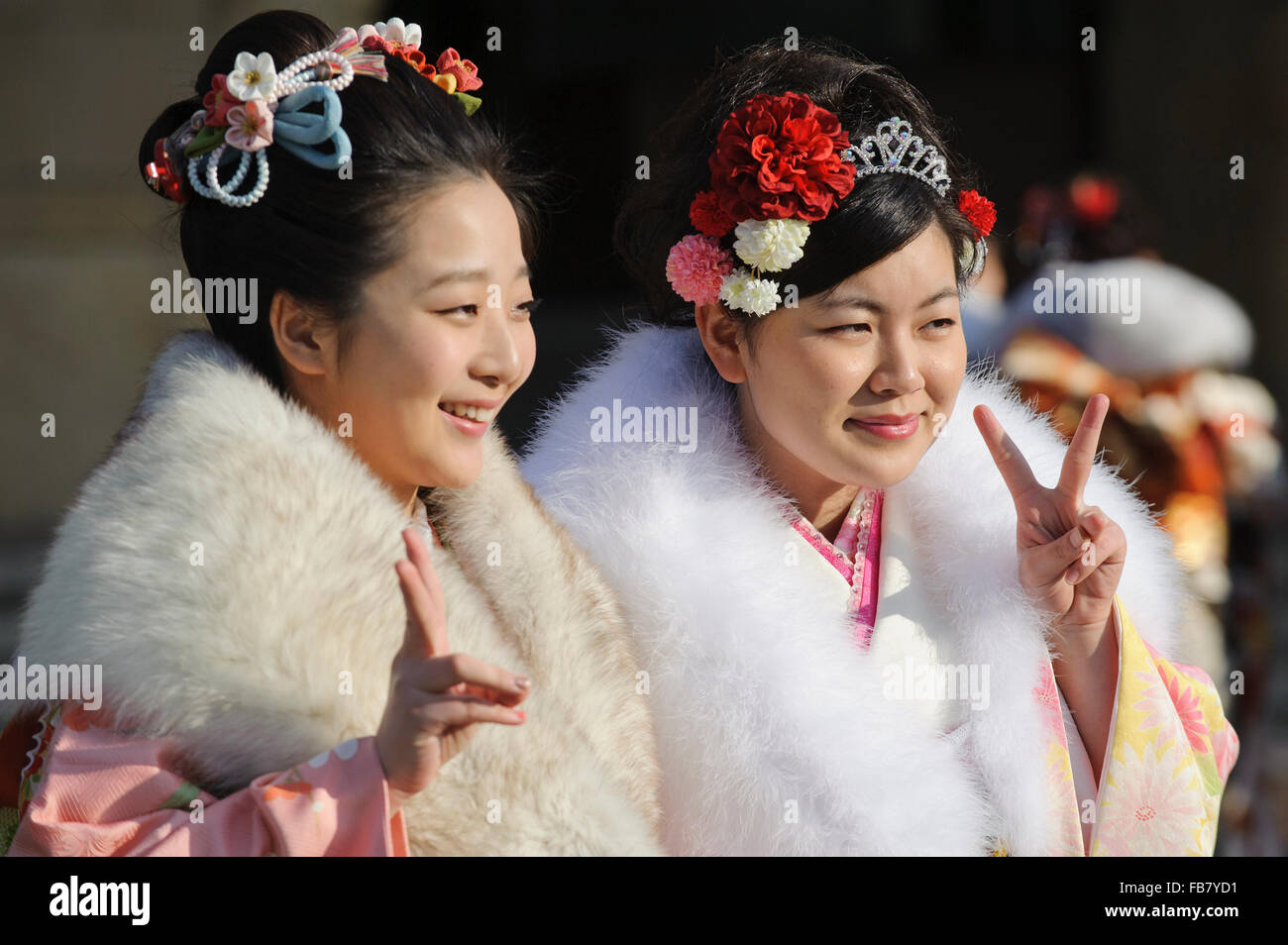JANUARY 11, 2016 - Young women wearing traditional furisode pose for ...
