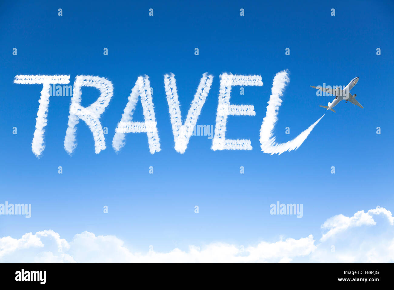 travel text drawing by airplane in the sky Stock Photo - Alamy