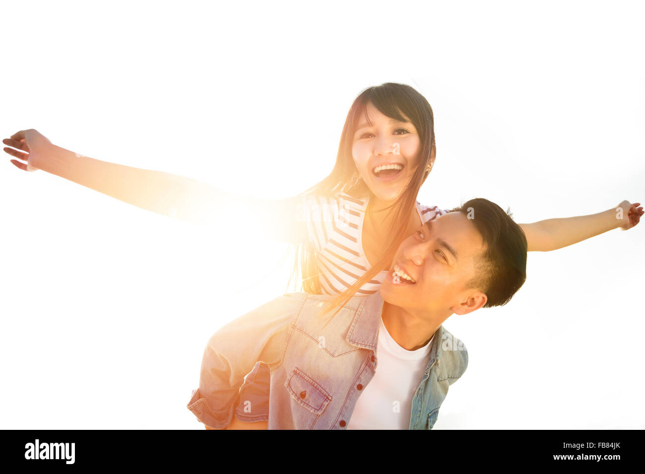 happy young Couple in love with sunlight background Stock Photo - Alamy