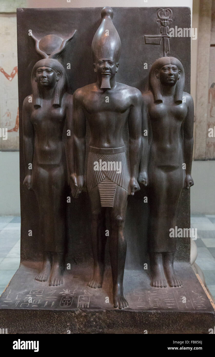 Menkaura flanked by the goddess Hathor (left) and a nome goddess Bat ...