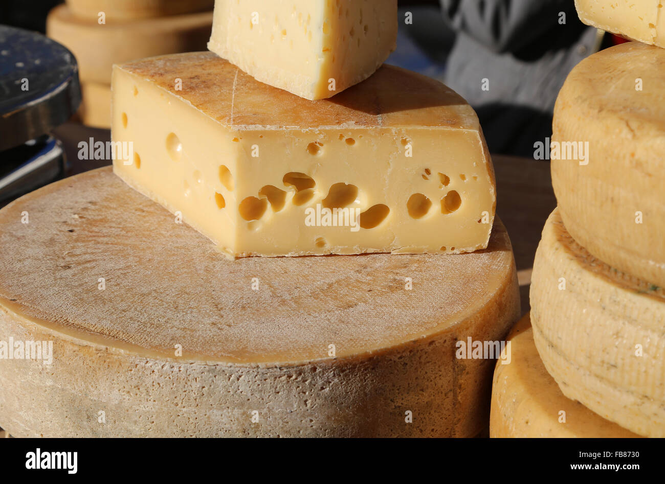 Hard cheese holes in hi-res stock photography and images - Alamy