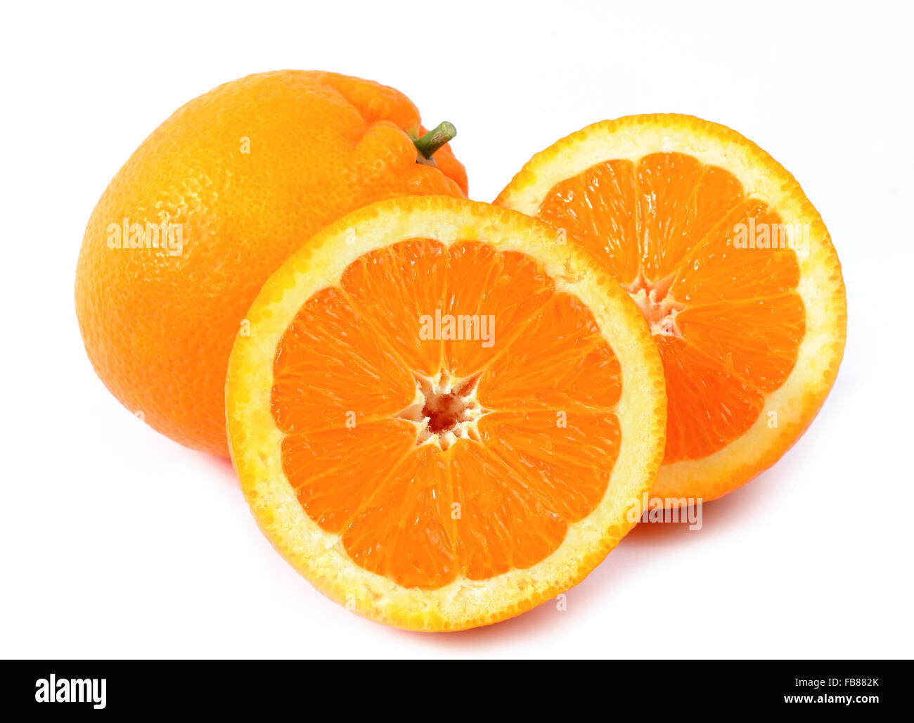 Oranges harvested in an organic cultivation, photographed on white ...