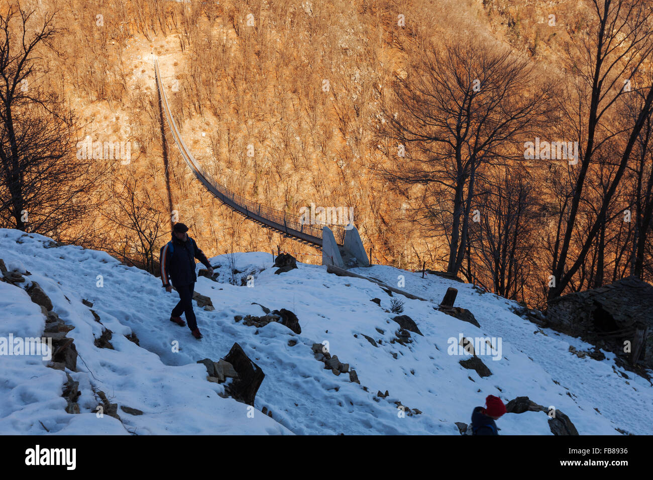 Mountain landscape with suspension bridge over the valley Stock Photo ...