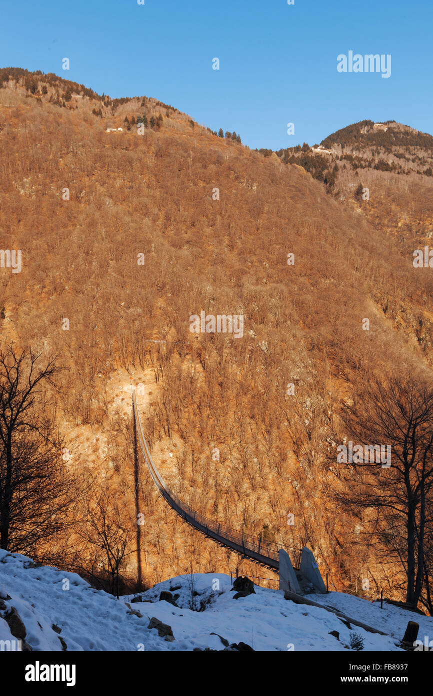 Mountain landscape with suspension bridge over the valley Stock Photo ...