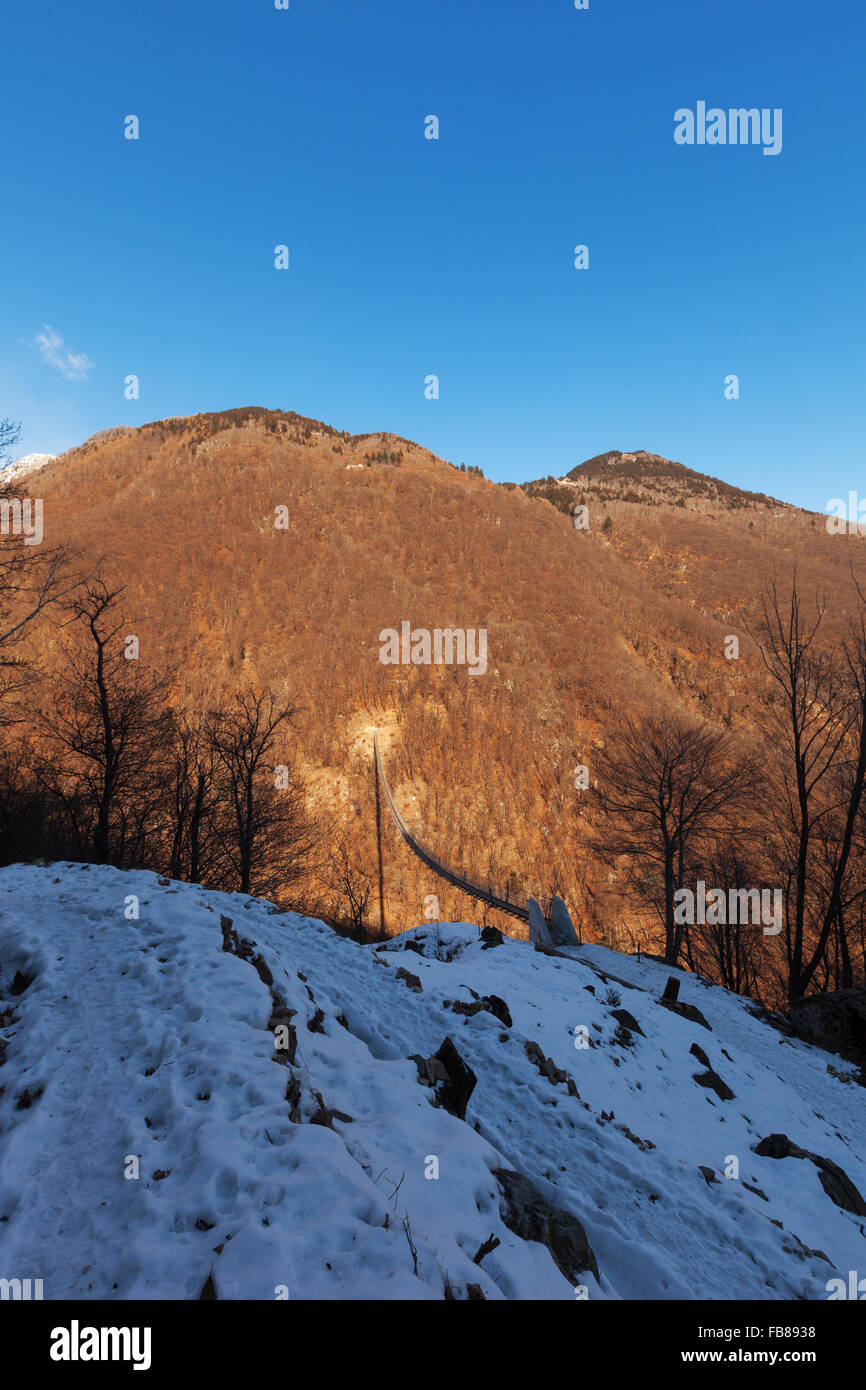 Mountain landscape with suspension bridge over the valley Stock Photo ...