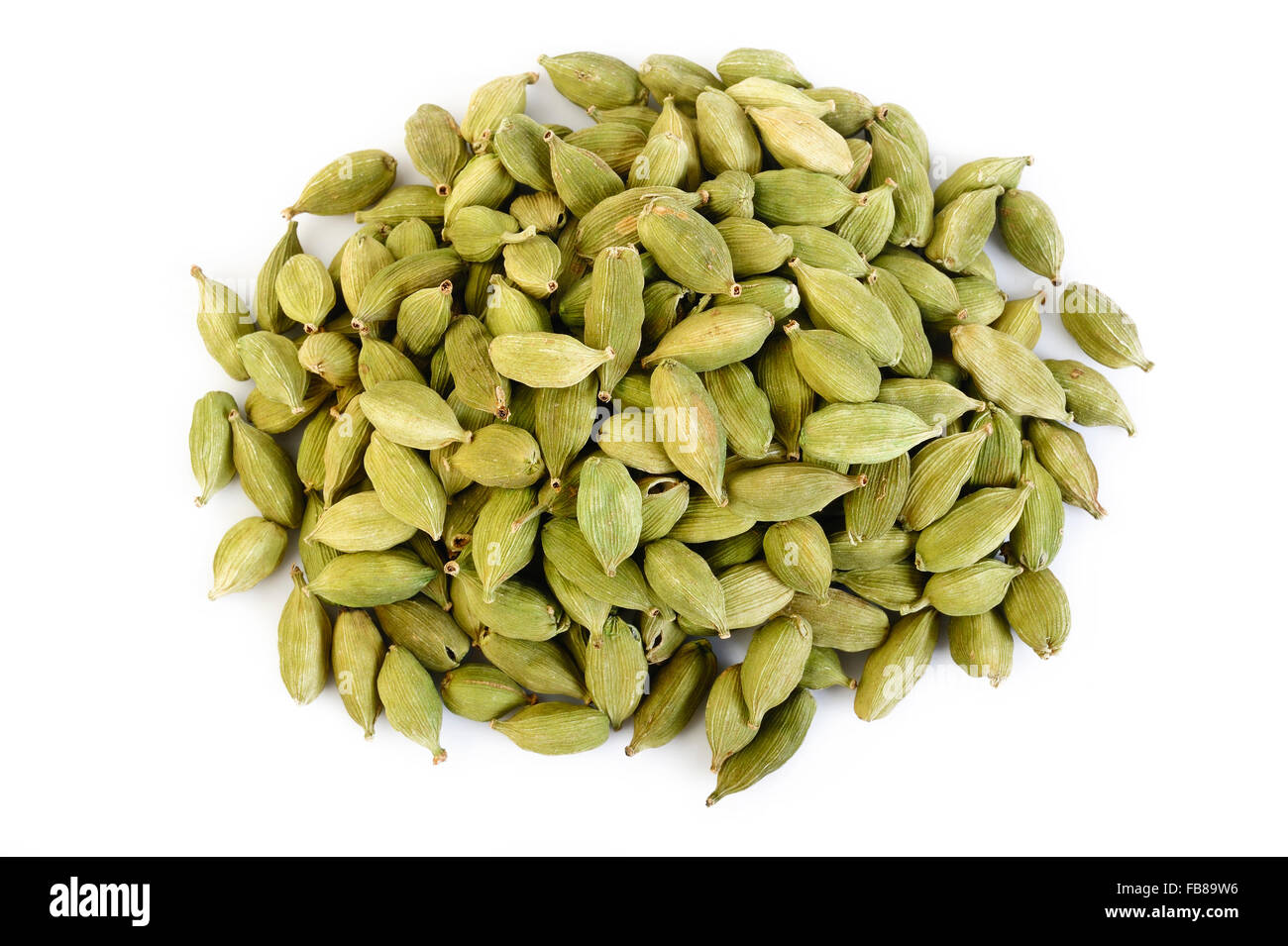 cardamon pods on white background Stock Photo - Alamy