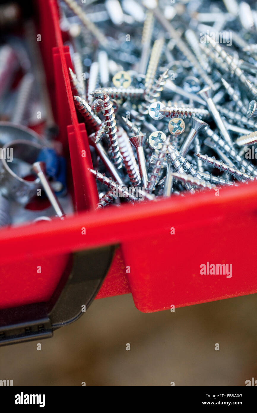 Bolts in red box Stock Photo - Alamy