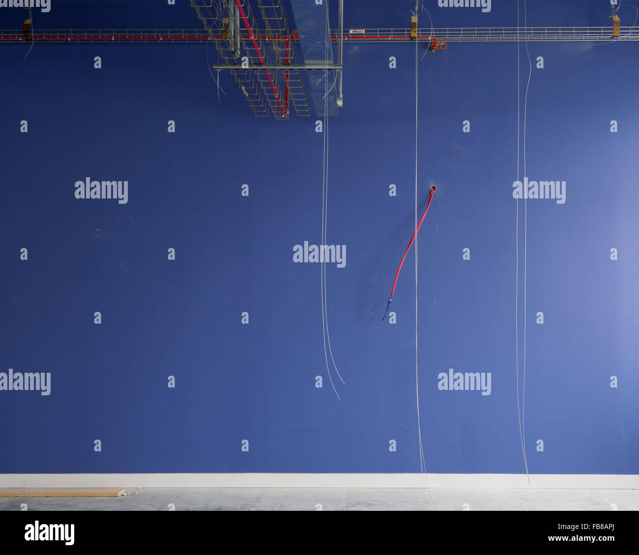 Construction. Newly painted blue wall. Cockcroft Building, University ...