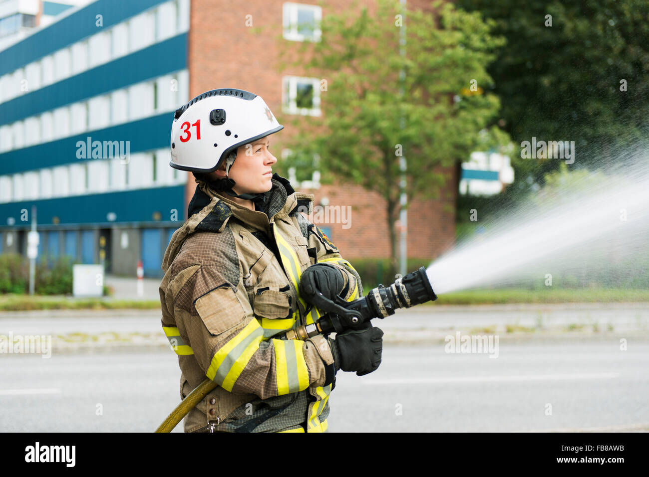 Emergency fire hose hi-res stock photography and images - Alamy