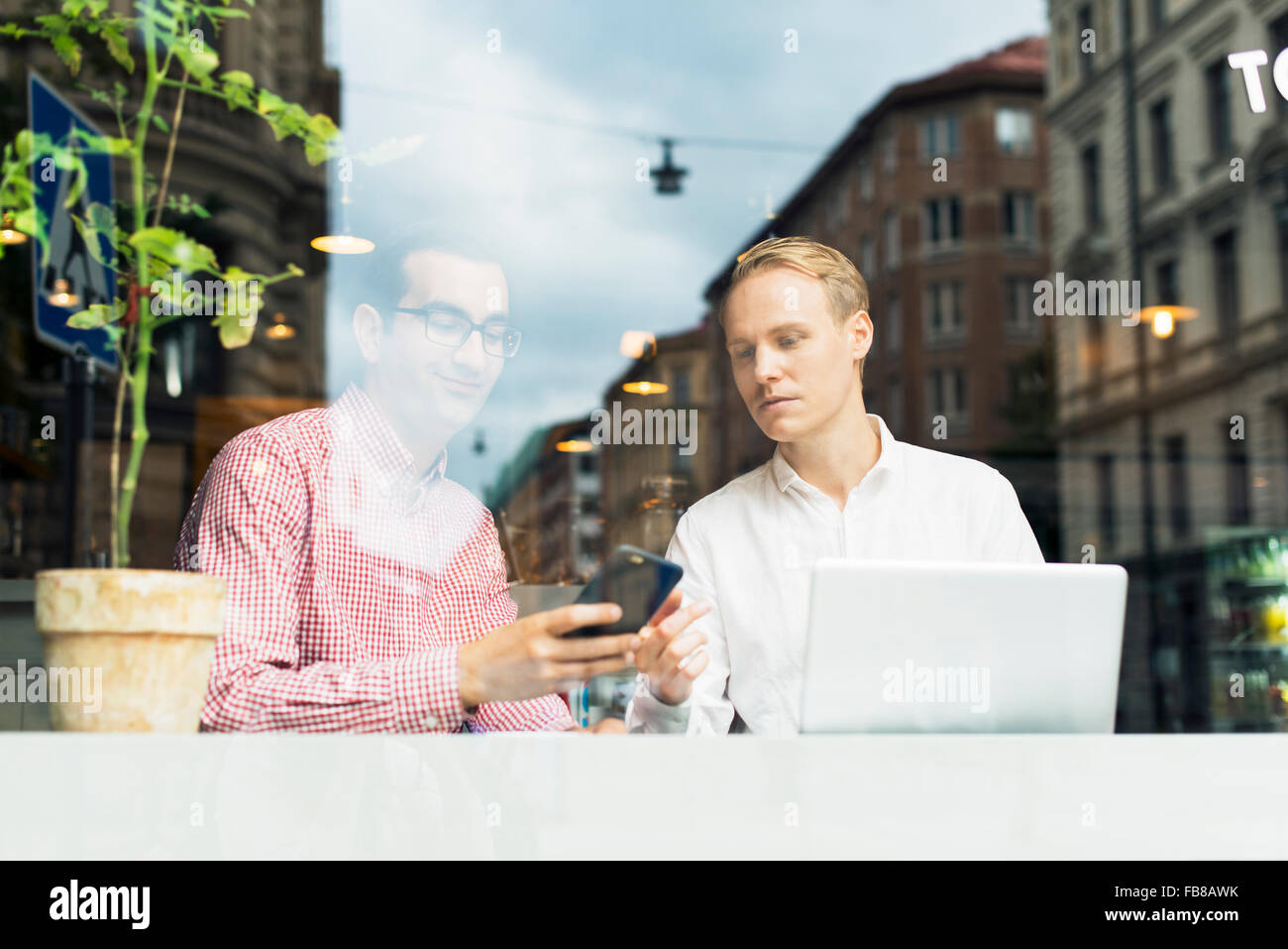 Two men come hi-res stock photography and images - Alamy