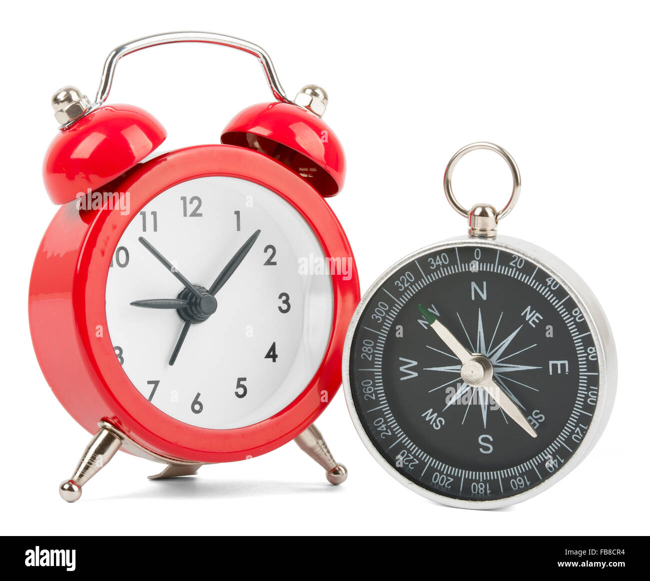 Compass with alarm clock Stock Photo - Alamy