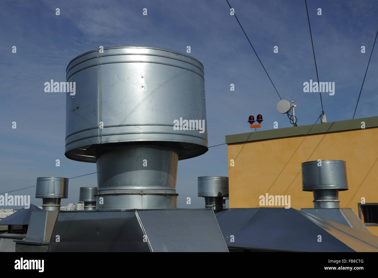 Rooftop industrial building exhaust pipes hi-res stock photography and ...