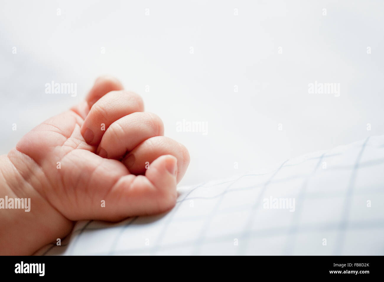 Baby boy hand hi-res stock photography and images - Alamy
