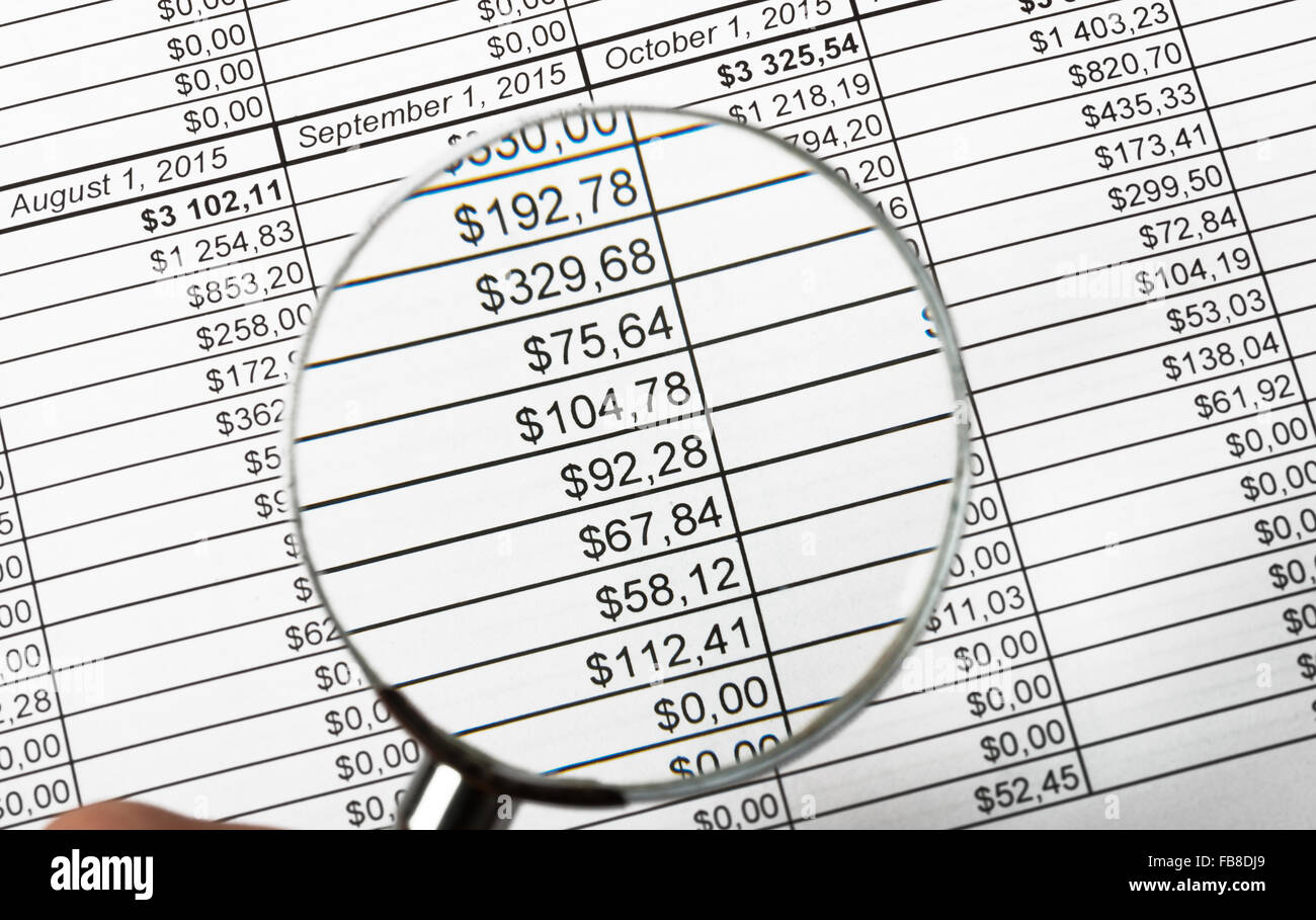 Man holding magnifier Stock Photo - Alamy