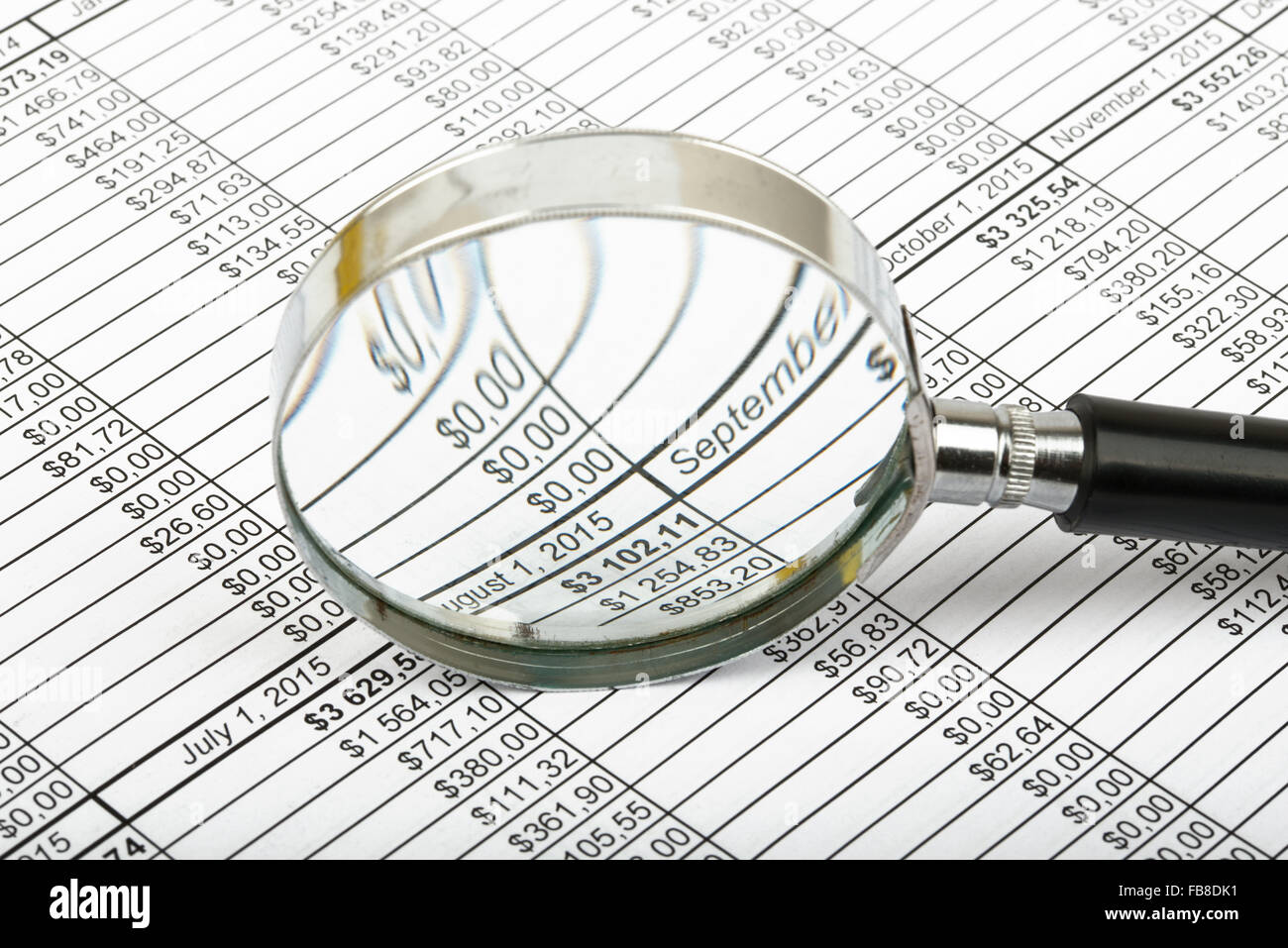 Magnifier with documents Stock Photo - Alamy