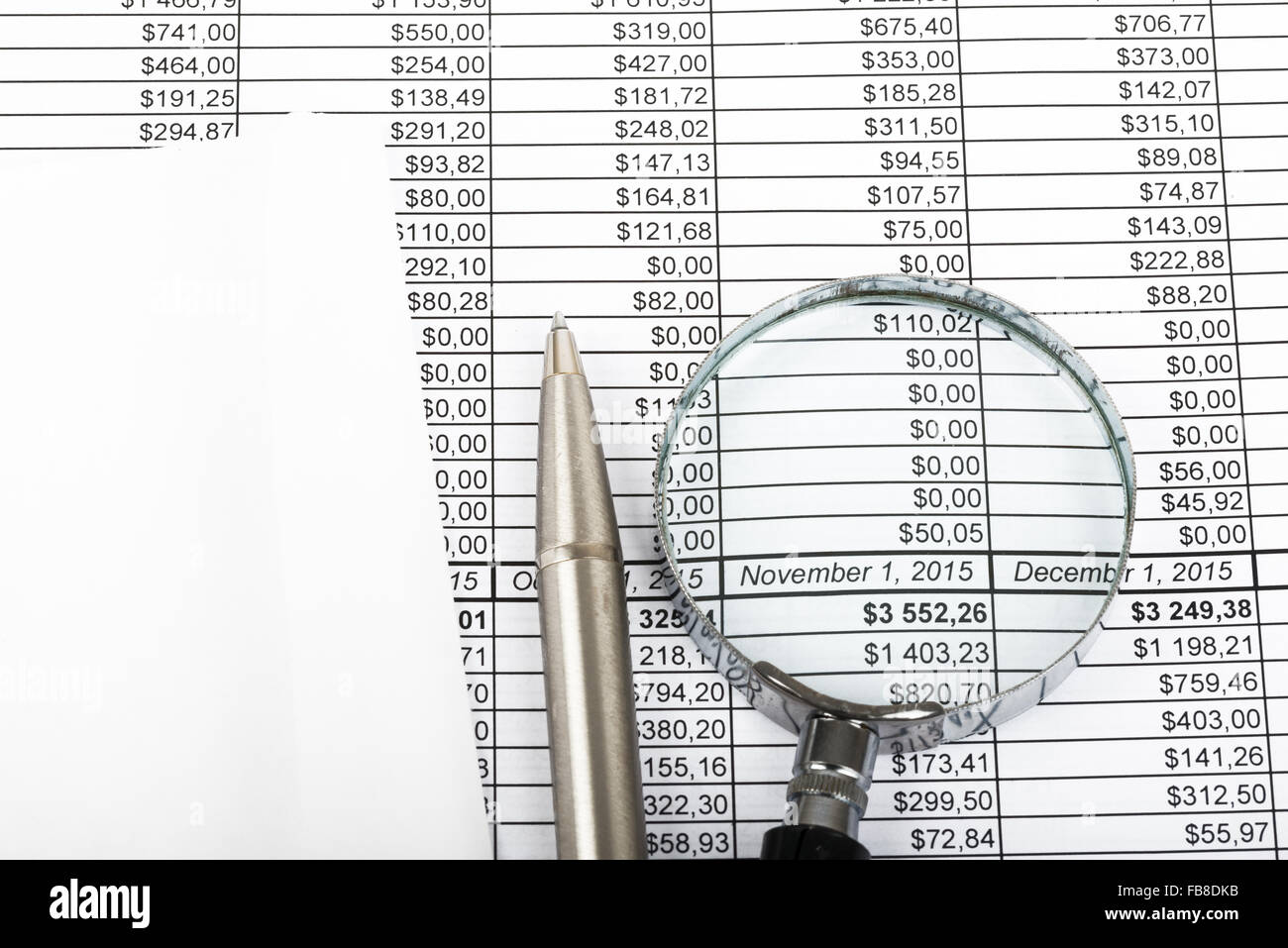 Magnifier with pen Stock Photo - Alamy