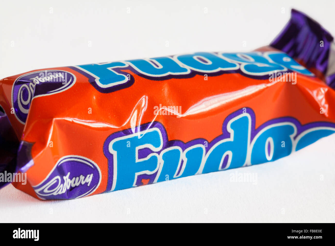 Cadbury Fudge chocolate from packet of Heroes set on white background ...
