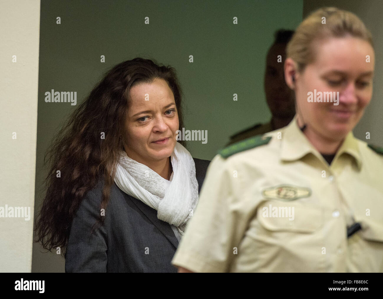 Munich, Germany. 12th Jan, 2016. Defendant Beate Zschaepe enters the ...
