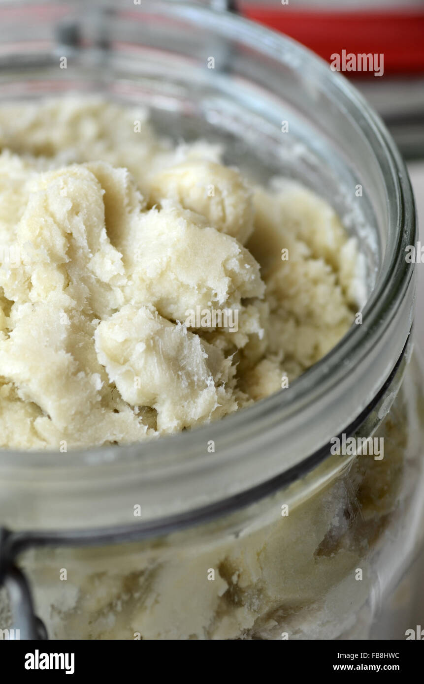 Unrefined raw shea butter on wooden background Stock Photo - Alamy