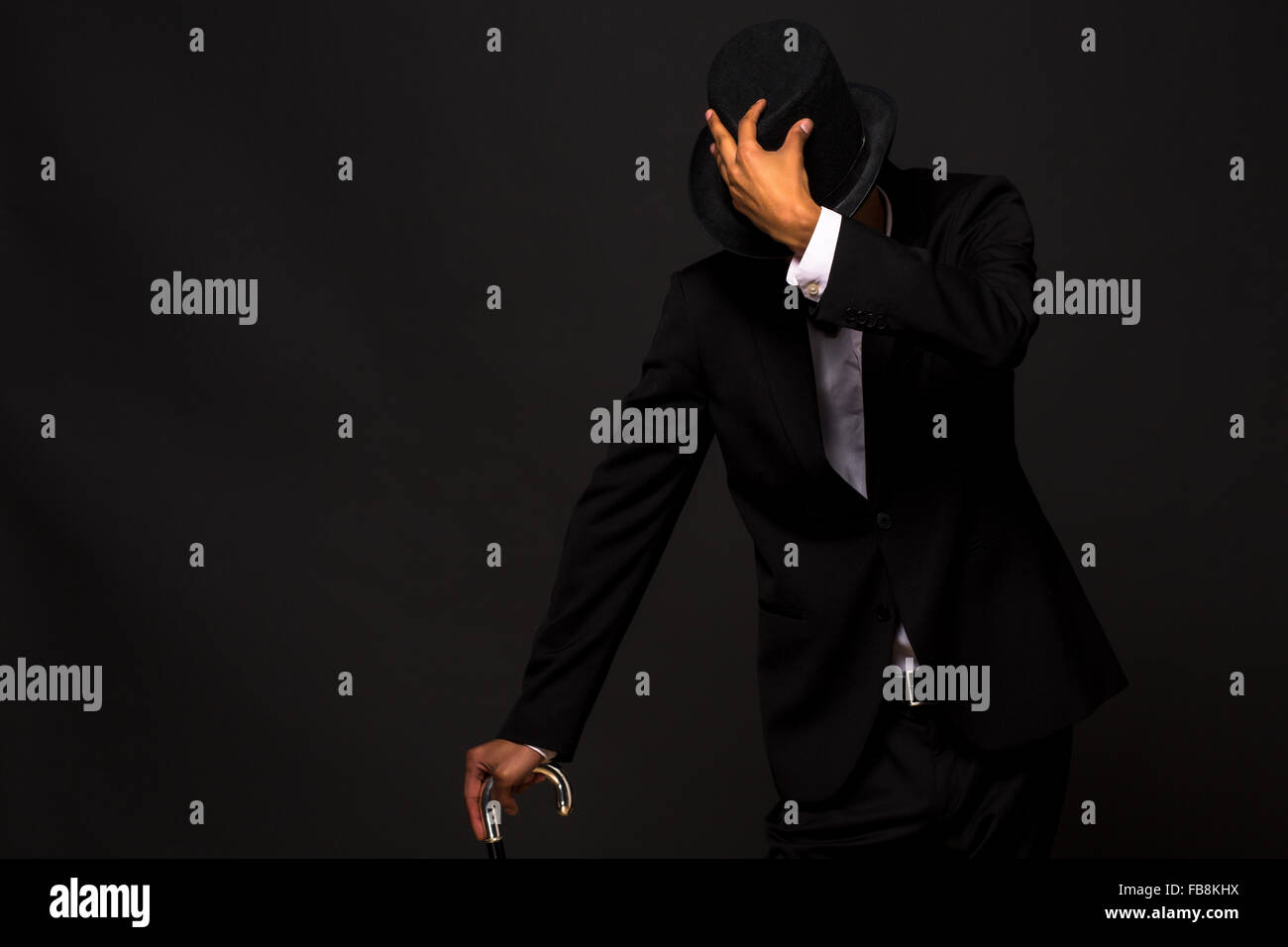 Cane man hat suit hi-res stock photography and images - Alamy