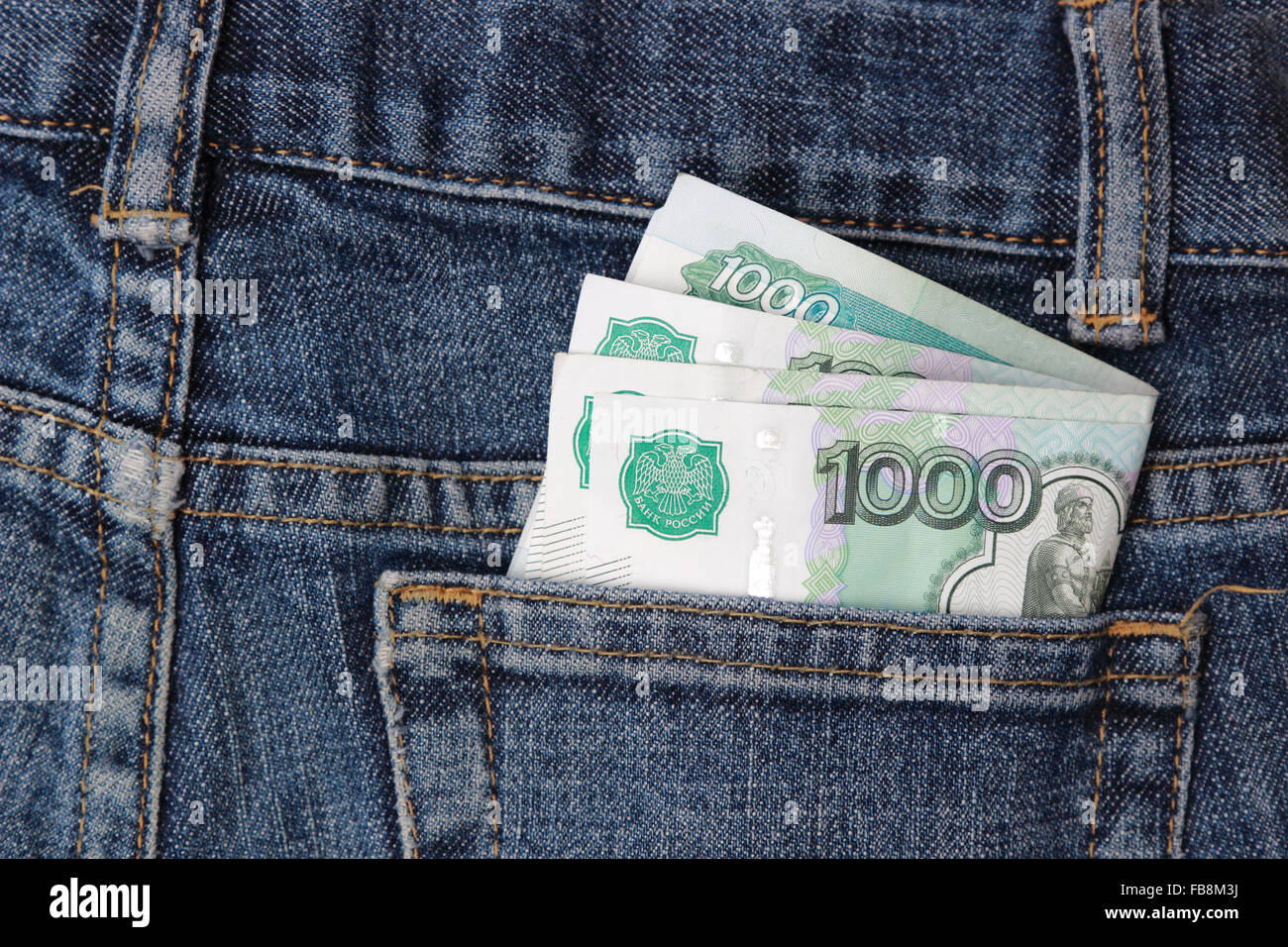 Russian money rubles in blue jeans pocket as a top view image Stock ...