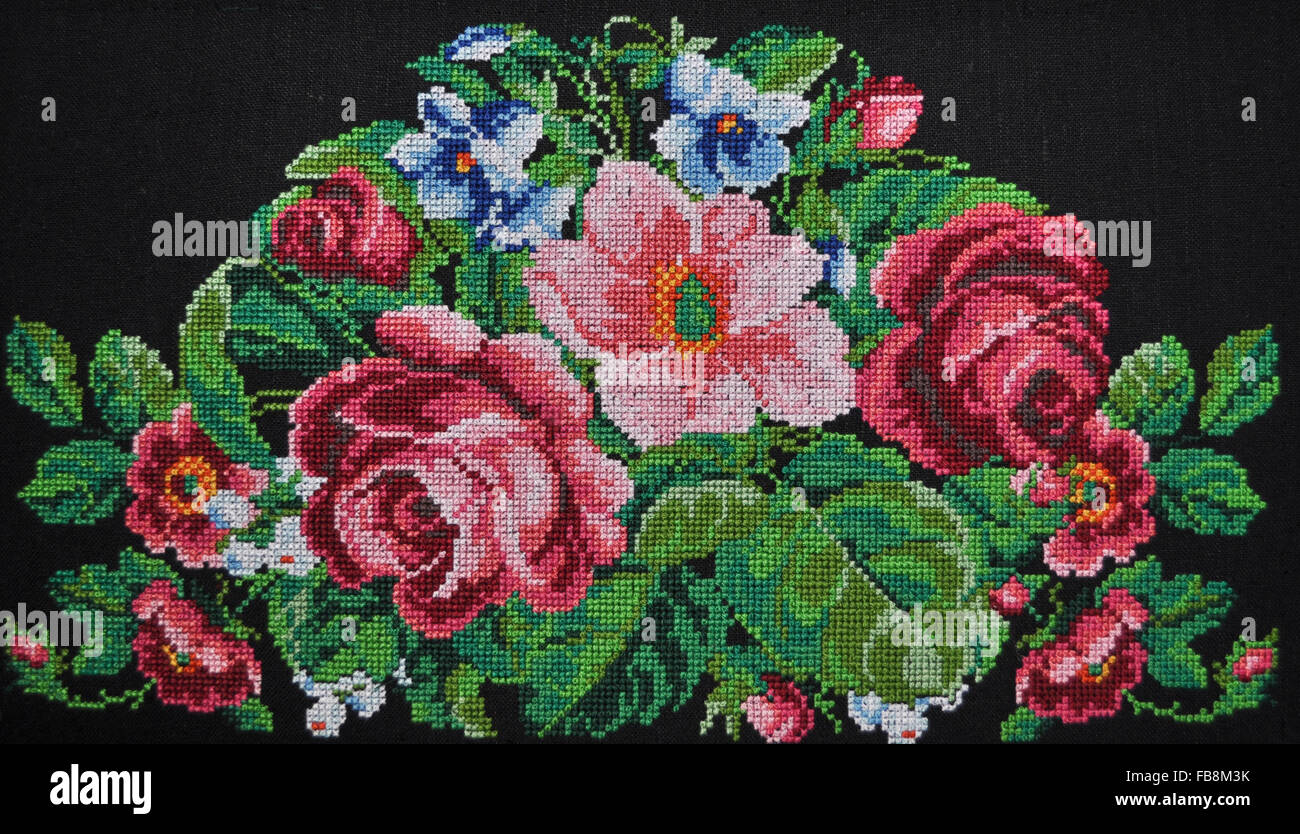 Cross stitch pattern of colors on linen Stock Photo - Alamy