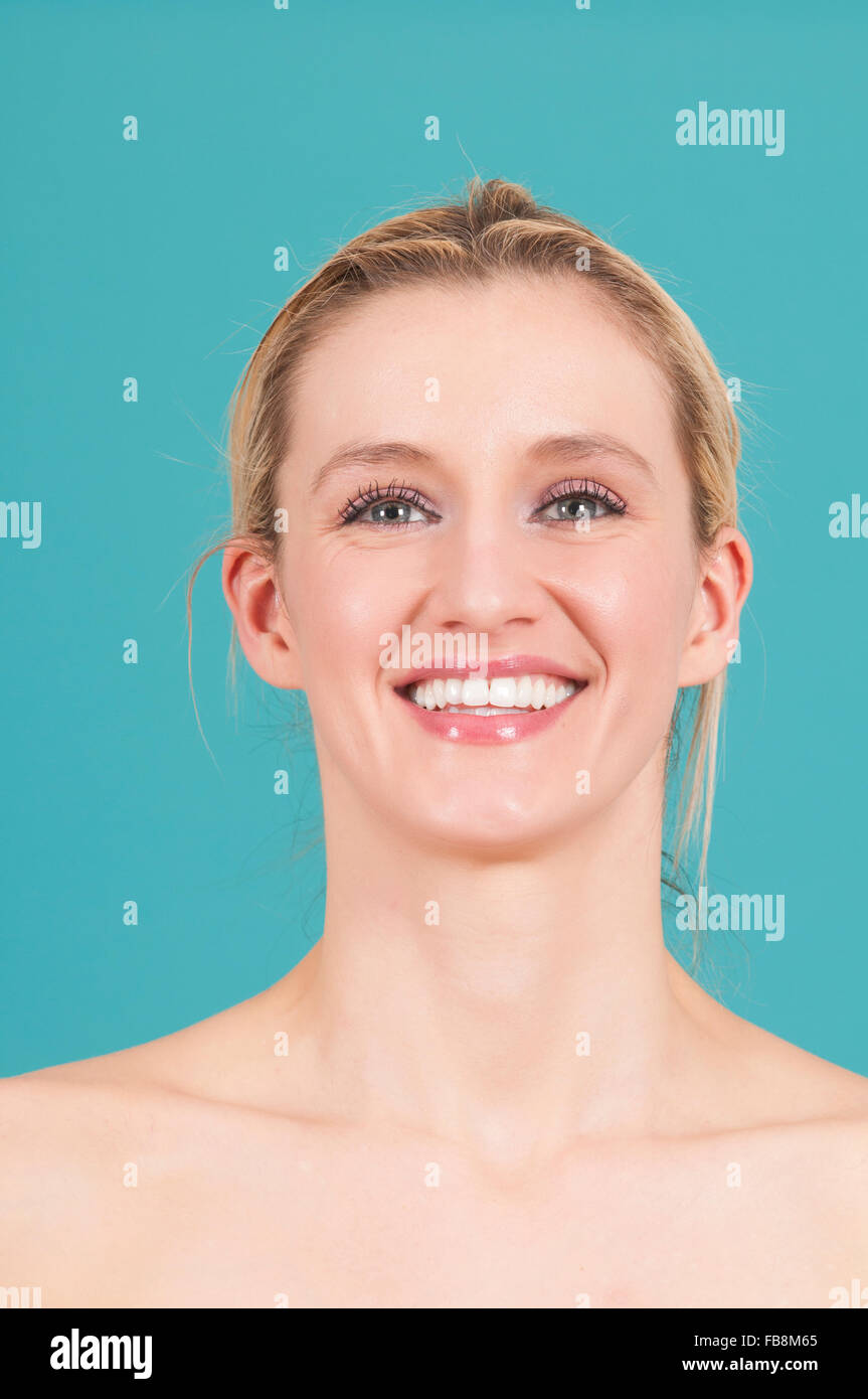 Happy woman smiling looking up Stock Photo - Alamy