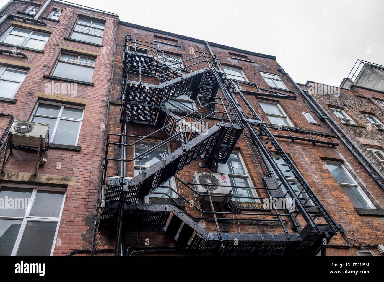 Fire escape up the side of a 5 storey building Stock Photo - Alamy