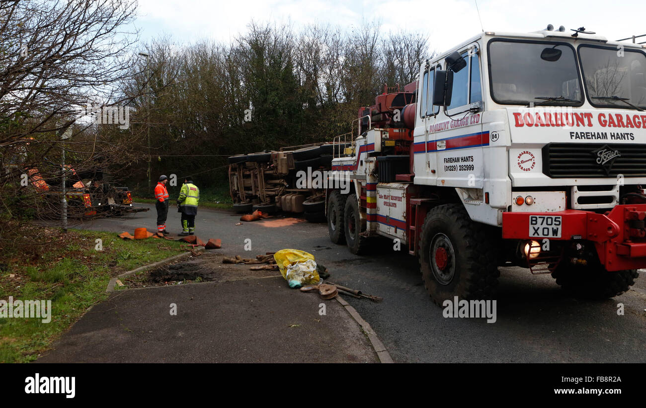 Fareham, Hampshire, UK. 12th January 2016. A refuse lorry overturned at ...