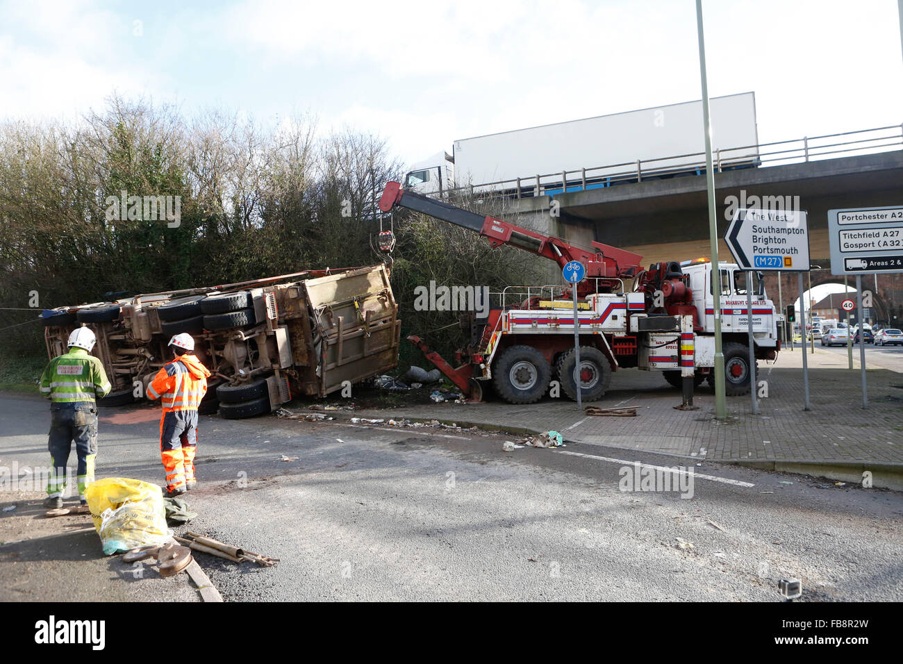 Fareham, Hampshire, UK. 12th January 2016. A refuse lorry overturned at ...