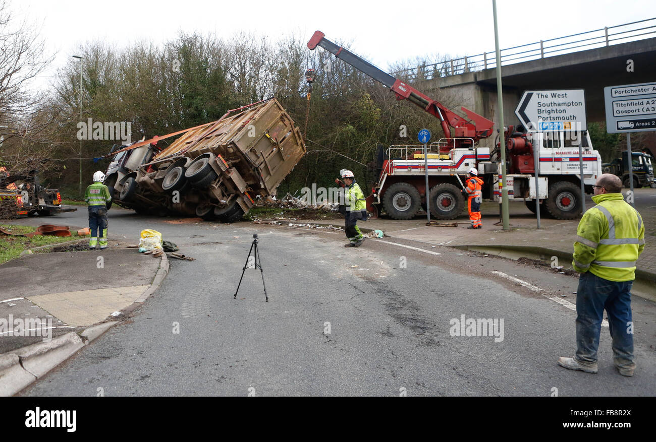 Fareham, Hampshire, UK. 12th January 2016. A refuse lorry overturned at ...