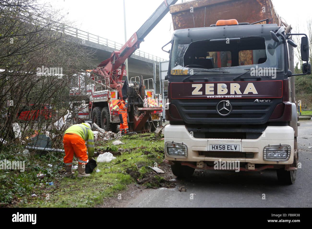 Fareham, Hampshire, UK. 12th January 2016. A refuse lorry overturned at ...
