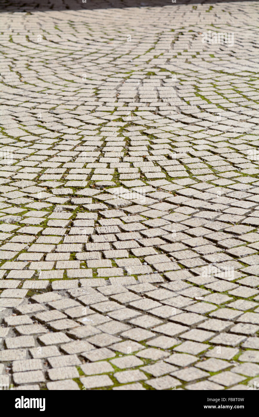 Curved stone paving pattern on ground Stock Photo - Alamy