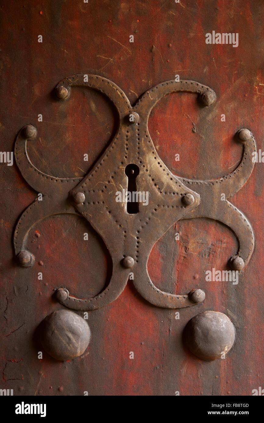 Carved key hole in an antique wooden door vertical Stock Photo - Alamy