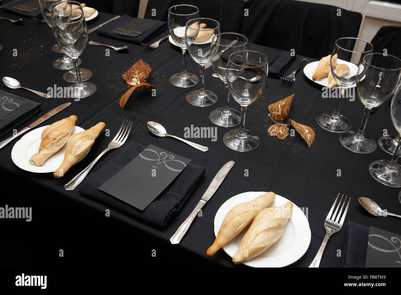 Dishware set in a restaurant table horizontal Stock Photo - Alamy