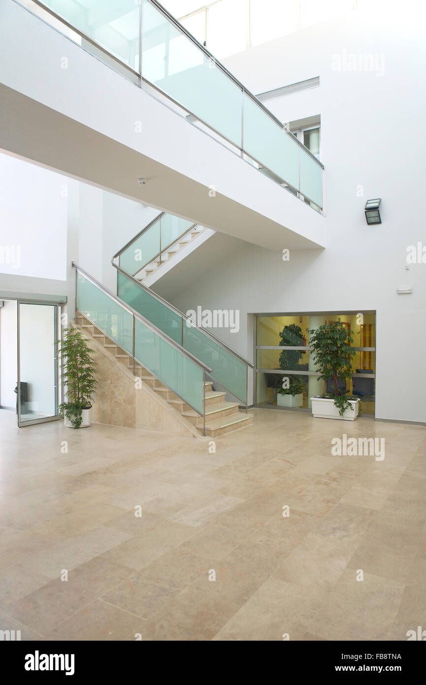 Entrance hall in a modern office building with elevated walkway Stock ...