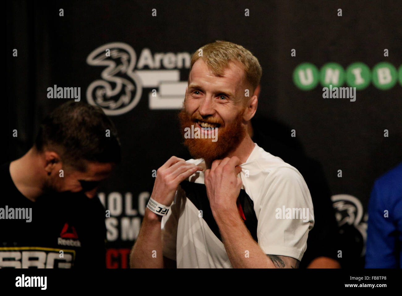 Paddy Holohan removes his clothes before being weighed at Weigh In UFC ...